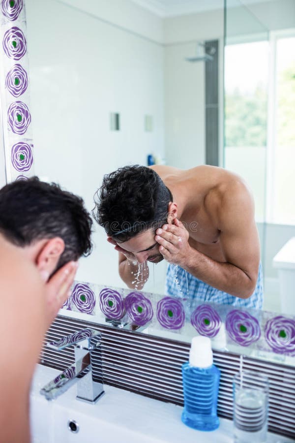 Handsome Man Washing His Face Stock Photo - Image of closed, sink: 66161392