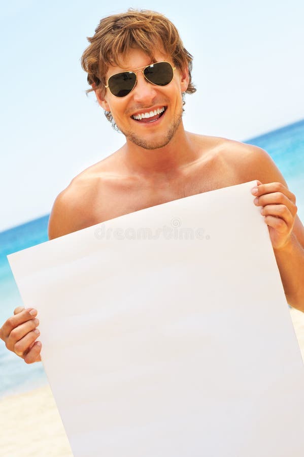 Handsome Man with White Sign Stock Photo - Image of holding, outdoors ...