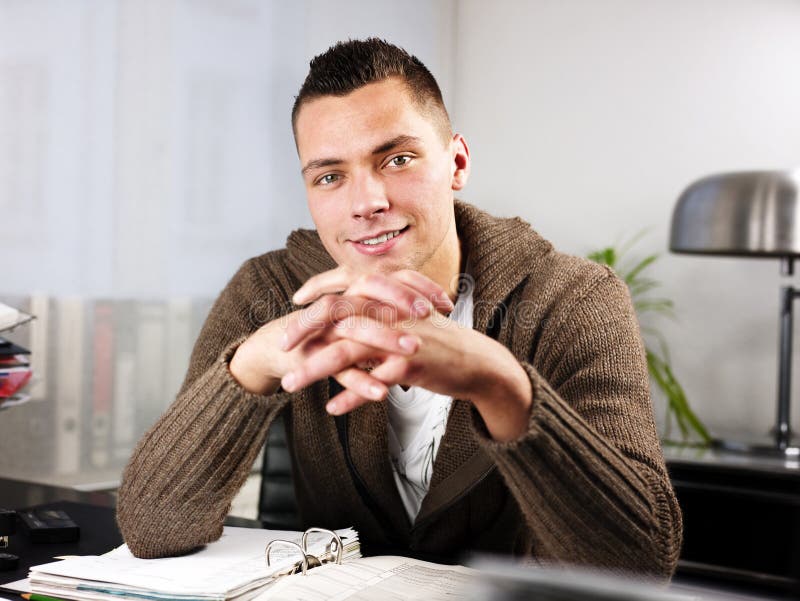 Handsome man at work stock photo. Image of folder, male - 22535016