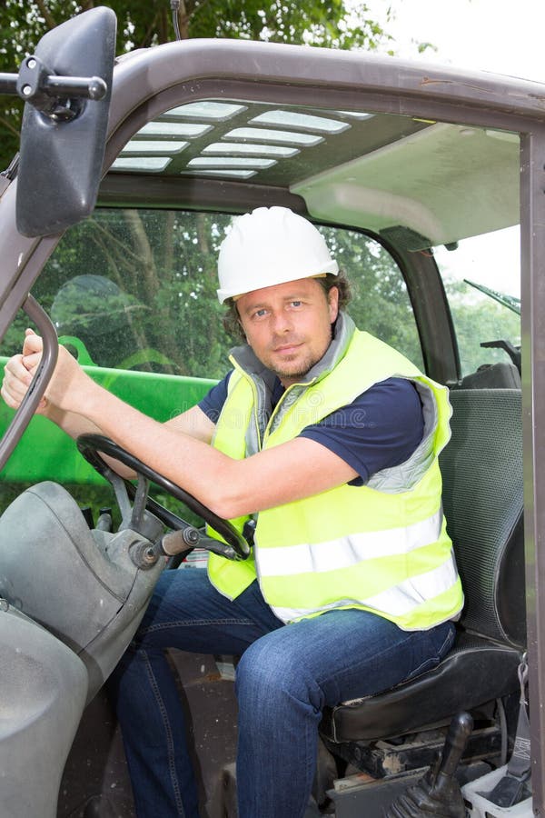 Construction Worker with Forklift Truck Stock Photo - Image of portrait ...