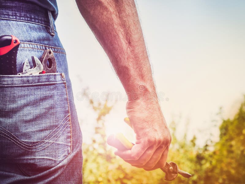 Handsome Man in Working Clothes with Tools Stock Image - Image of ...