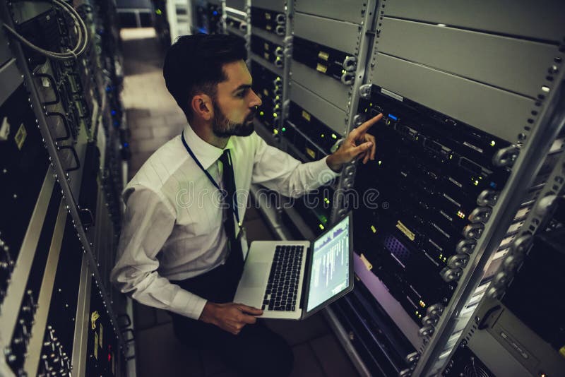Man in data centre stock photo. Image of database, people - 104994276