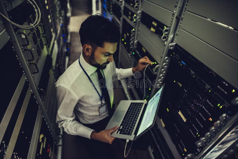 Man in data centre stock image. Image of caucasian, maintenance - 104994669