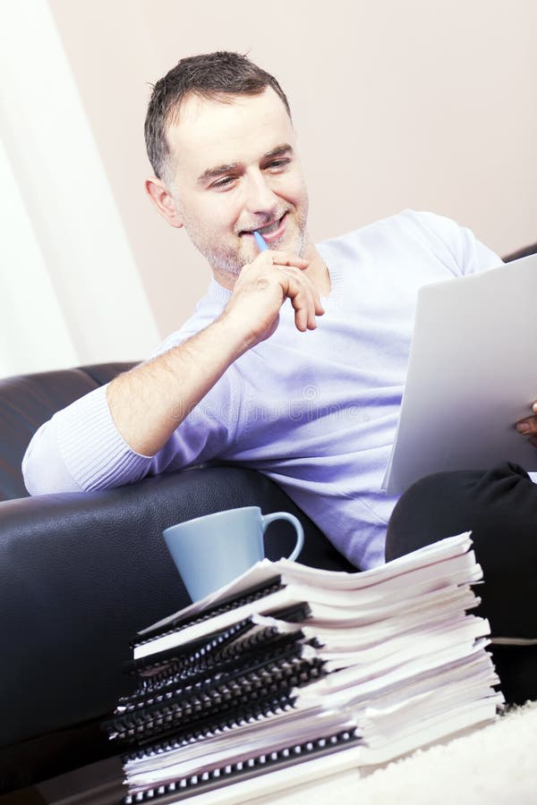 Handsome Man Working at Home. Stock Image - Image of computer, looking ...