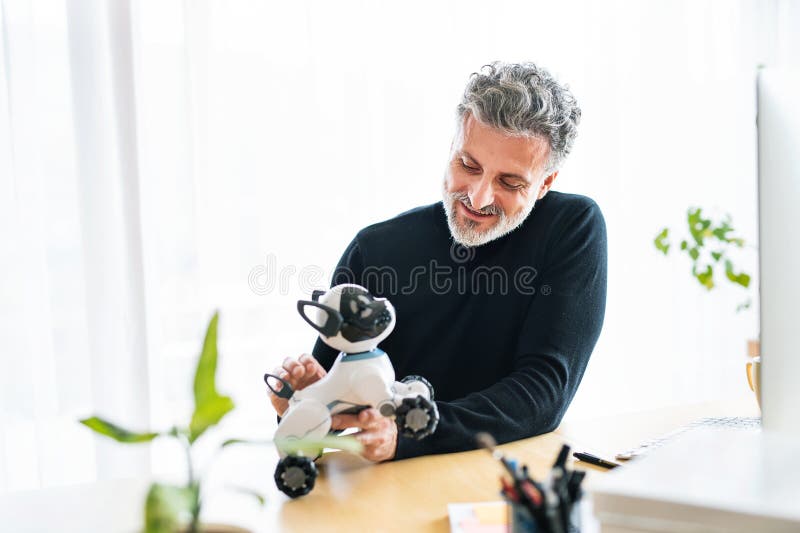 Handsome Man Working from Home Office, Sitting at Desk with Computer ...