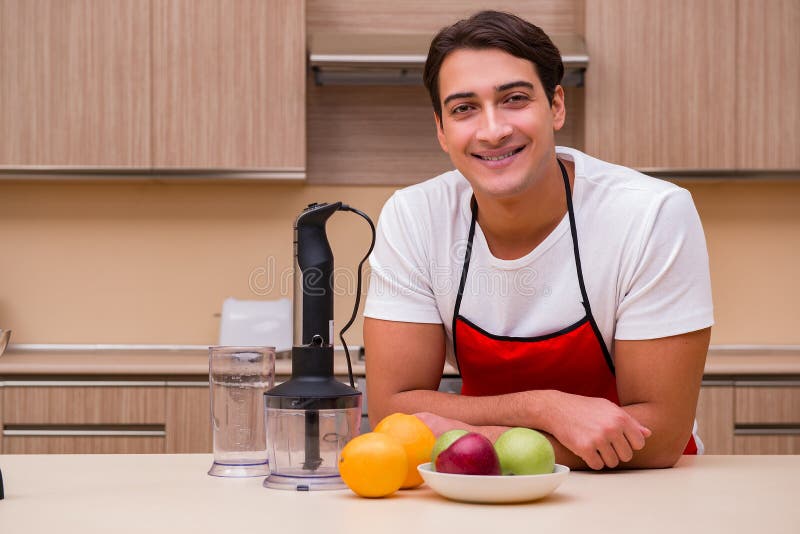 The Handsome Man Working at the Kitchen Stock Image - Image of apples ...
