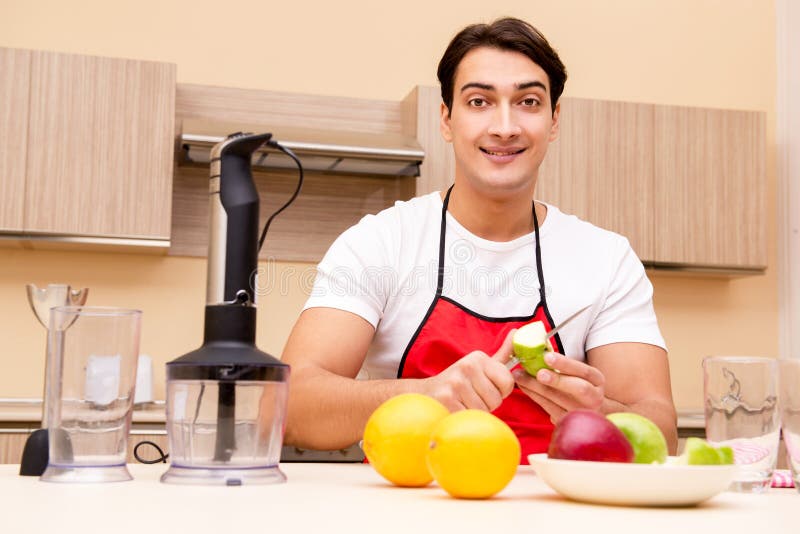 The Handsome Man Working at the Kitchen Stock Photo - Image of fruit ...