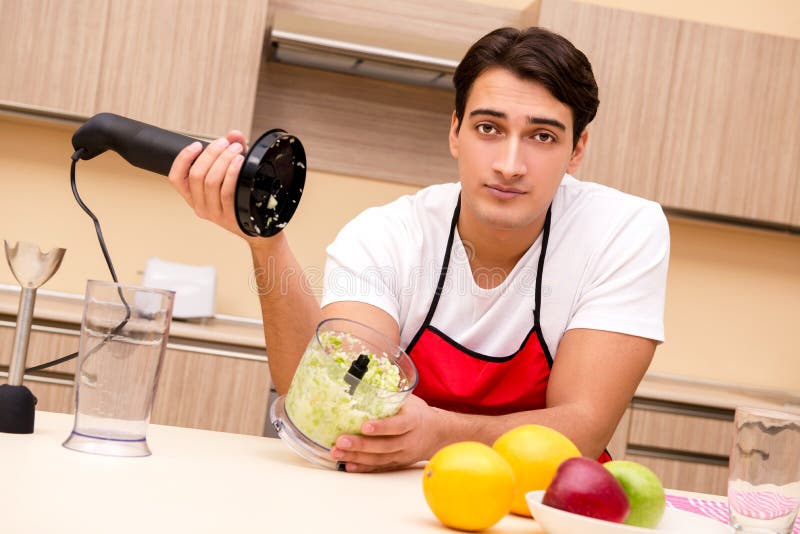 The Handsome Man Working at the Kitchen Stock Photo - Image of juicer ...