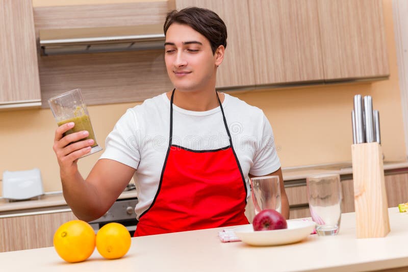 The Handsome Man Working at the Kitchen Stock Photo - Image of husband ...