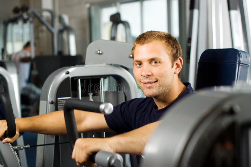 Handsome man working out stock image. Image of wellbeing - 10472427