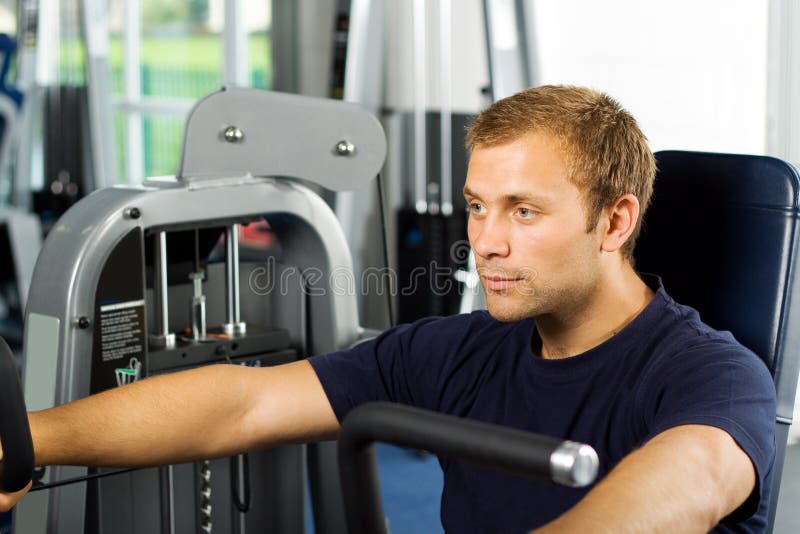 Handsome man working out stock photo. Image of gymnasium - 10516462