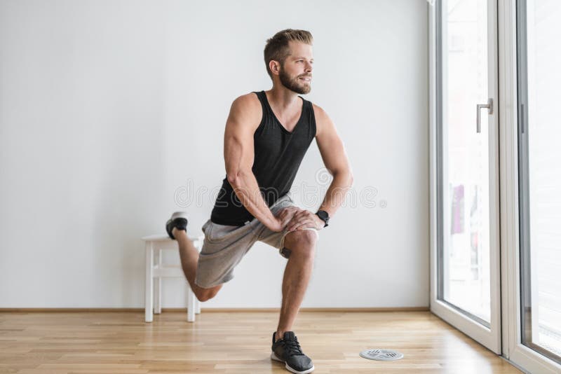 Handsome Man Working Out at Home Stock Photo - Image of home, activity ...