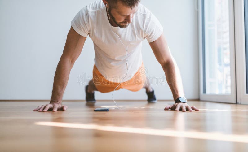 Handsome Man Working Out at Home Stock Photo - Image of loss ...