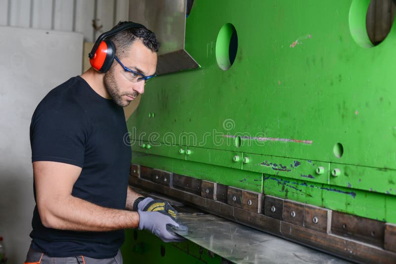 Handsome Man Working in a Workshop Steel Industry Factory Construction ...