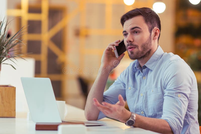 Handsome man working stock photo. Image of expression - 68212764