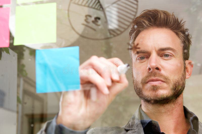 Handsome Man Writing on Transparent Idea Board Thinking Stock Image ...