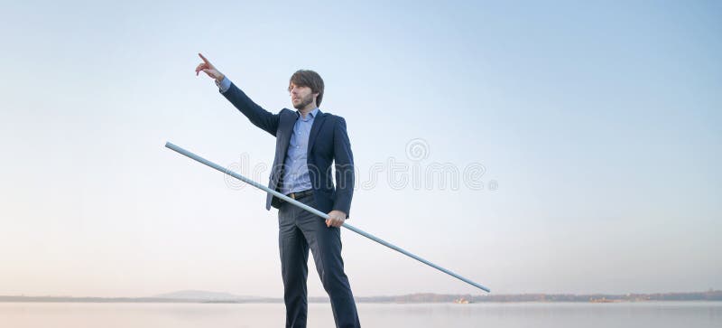 Handsome Manager Holding Long Stick Stock Image - Image of manager ...