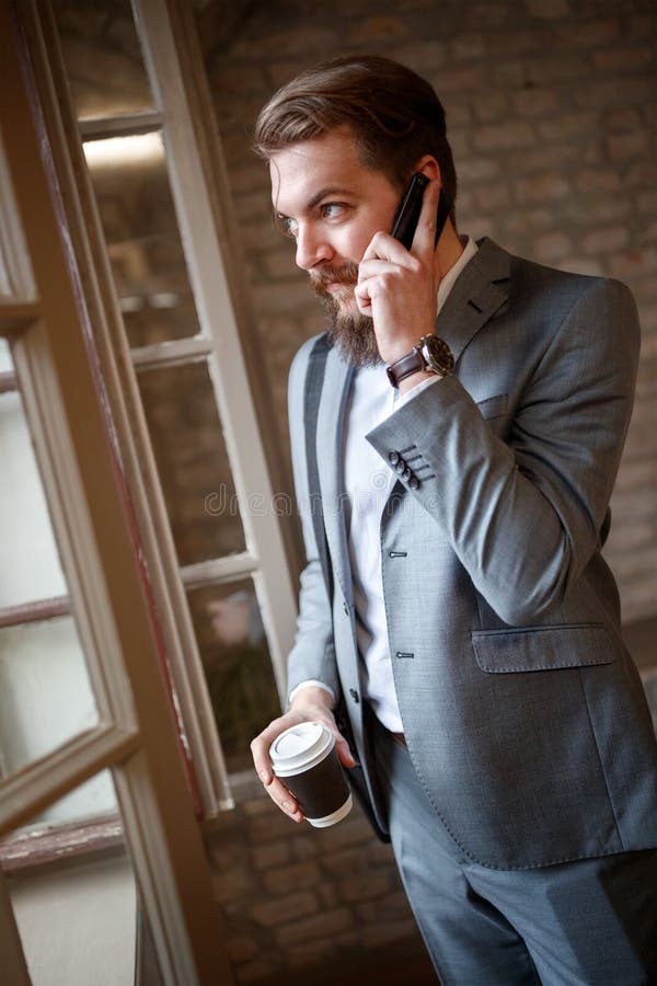 Manager Talking on Cell Phone in Firm Stock Image - Image of manager ...