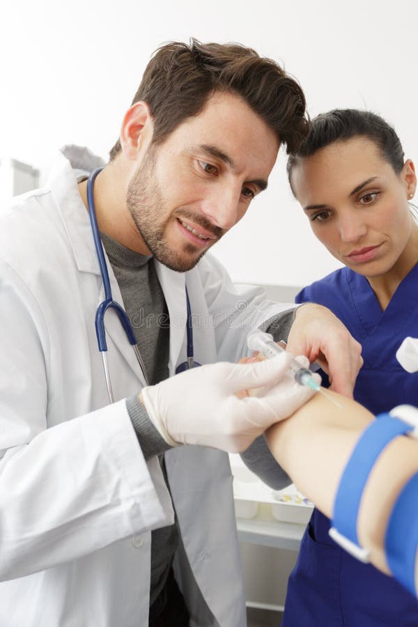 Handsome Mature Doctor Making Woman Injection Stock Photo - Image of ...
