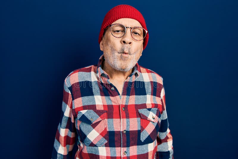 Handsome Mature Man Wearing Hipster Look with Wool Cap Making Fish Face ...