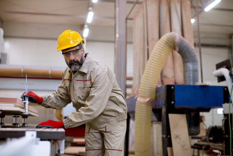 Handsome Mature Man Working in Furniture Factory Stock Photo - Image of ...