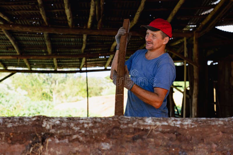 A Handsome Mature Man Working in a Sawmill Stock Image - Image of ...
