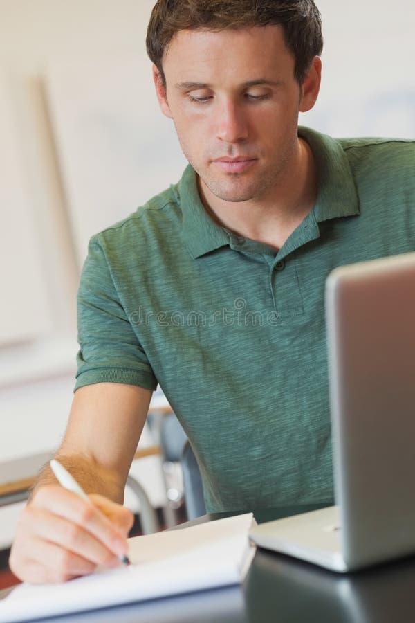 Handsome Mature Student Sitting in Classroom while Learning ...