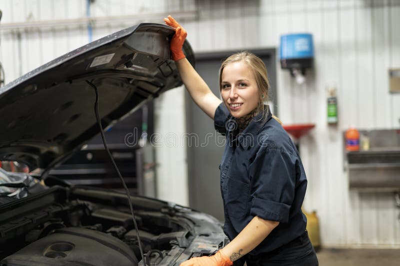 Handsome Mechanic Job Woman in Uniform Working on Car Stock Image ...