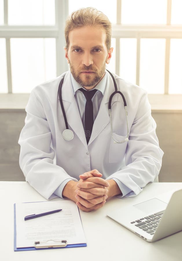 Handsome medical doctor stock photo. Image of laptop - 78526558