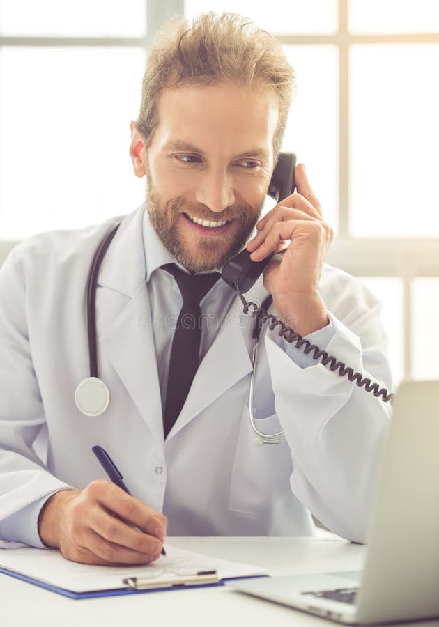 Handsome medical doctor stock photo. Image of patient - 78526582