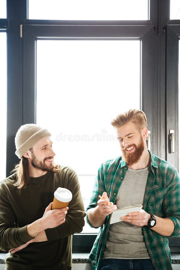 Handsome Men Colleagues in Office Talking with Each Other Stock Photo ...