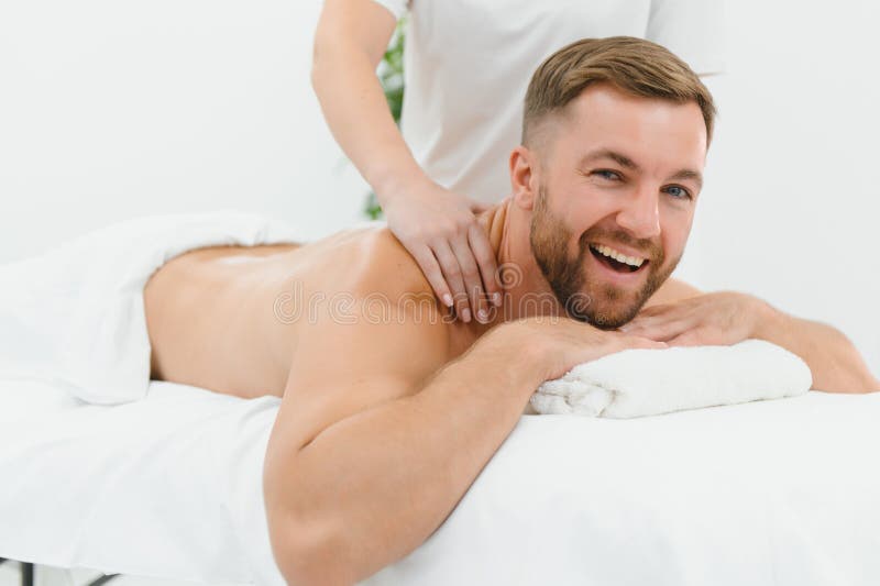 Handsome Man Receiving Massage at Spa Stock Photo - Image of adult ...