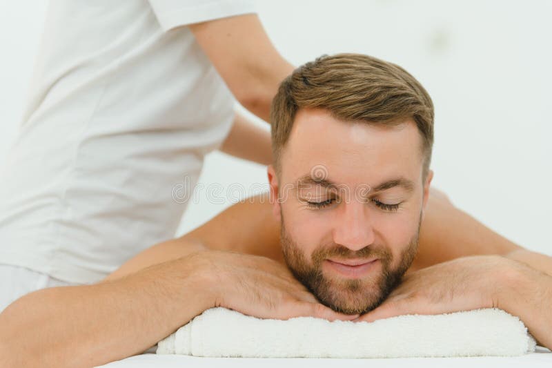 Handsome Man Receiving Massage at Spa Stock Image - Image of male ...