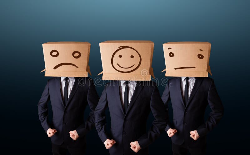 Handsome Men in Suit Gesturing with Drawn Smiley Faces on Box Stock ...