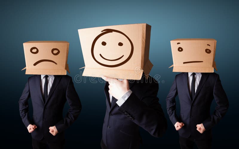 Handsome Men in Suit Gesturing with Drawn Smiley Faces on Box Stock ...