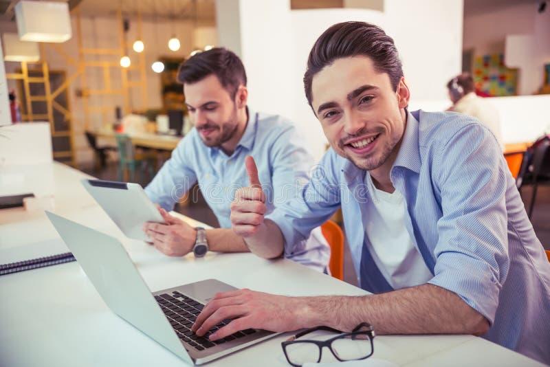 Handsome men working stock photo. Image of laptop, male - 68212430