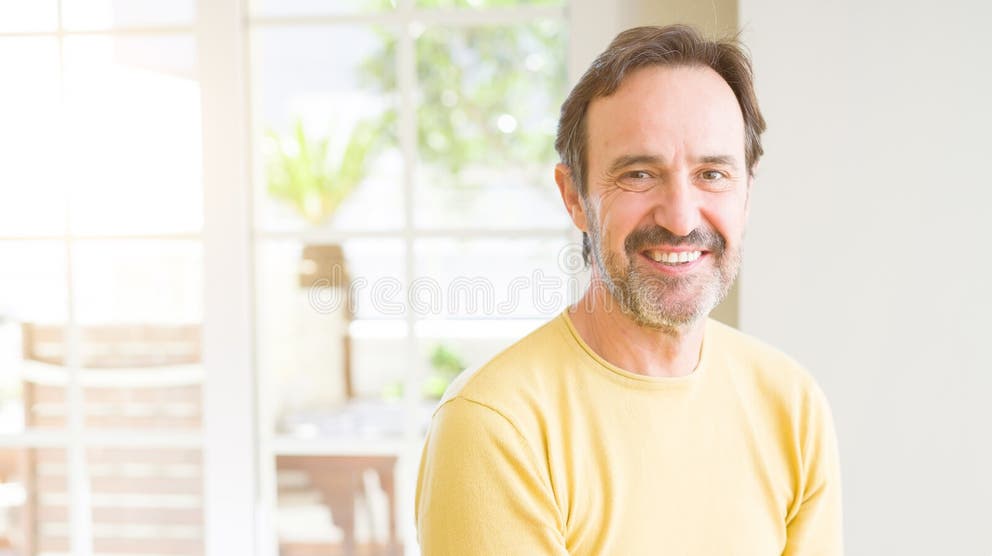Handsome Middle Age Man Smiling Looking at the Camera at Home Stock ...