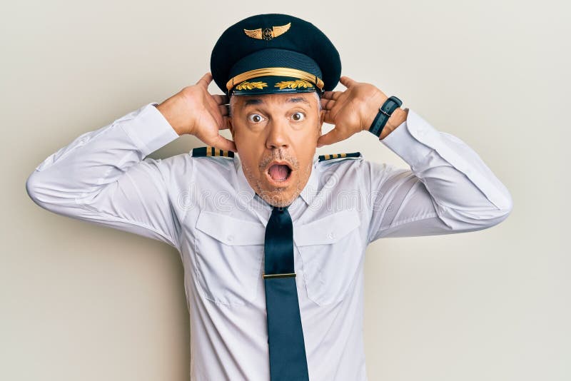 Handsome Middle Age Mature Man Wearing Airplane Pilot Uniform Crazy and ...