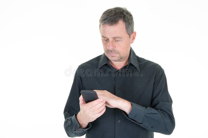 Handsome Middle Aged Man Writing Sms Text Message on His Cell Phone ...