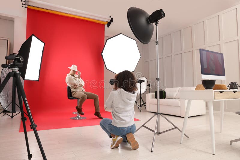 Handsome Model Posing for Professional Photographer in Studio Stock ...