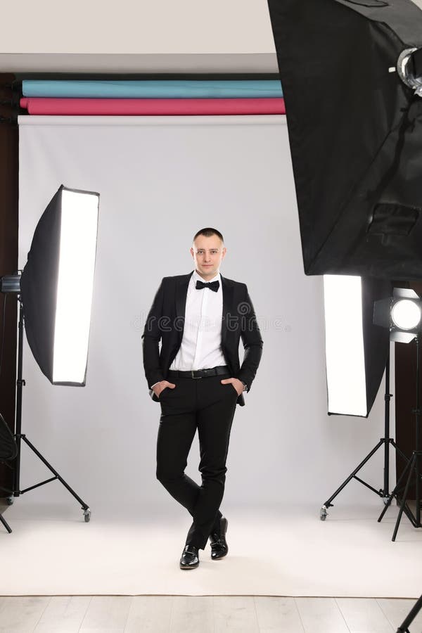 Handsome Model Posing in Studio. Professional Photo Session Stock Image ...