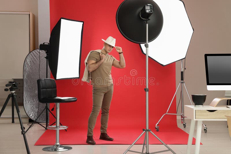 Handsome Model Posing in Studio. Professional Photo Session Stock Photo ...