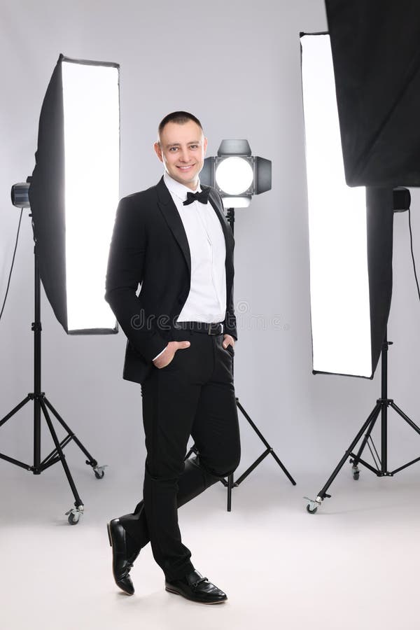 Handsome Model Posing in Studio. Professional Photo Session Stock Image ...