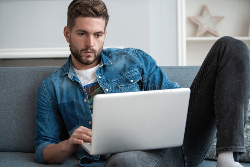 Handsome Modern Man Designer Working on Laptop Online, Using Internet ...