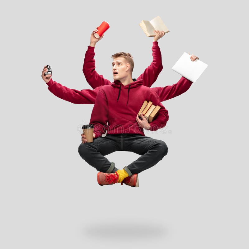 Handsome Multi-armed Student Levitating Isolated on Grey Studio ...