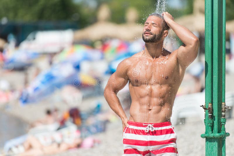 Handsome Muscle Man Takes a Shower Outdoors Stock Image - Image of ...