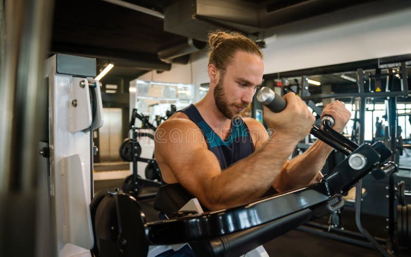 Handsome Muscular Man Working Out Hard at Gym Stock Image - Image of ...