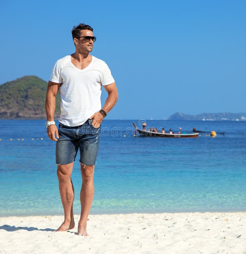 Handsome, Muscular Man Relaxing on a Tropical Beach Stock Image - Image ...