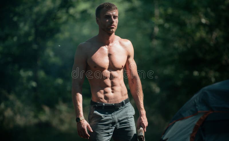 Handsome and Muscular Lumberjack Man with an Axe, Camping. Stock Image ...