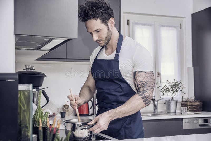Handsome Muscular Man in Kitchen, Cooking Stock Photo - Image of ...